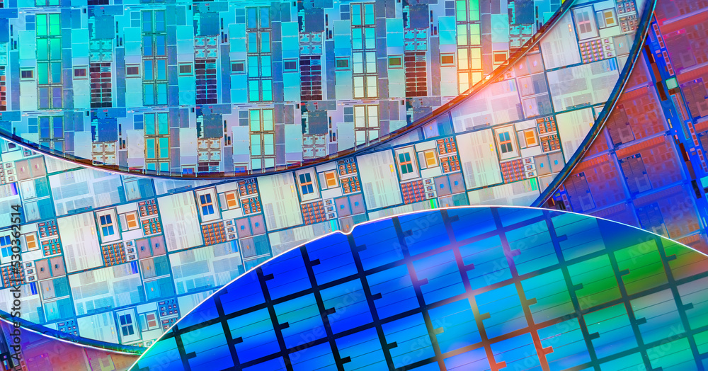 Silicon Wafer with microchips used in electronics for the fabrication ...