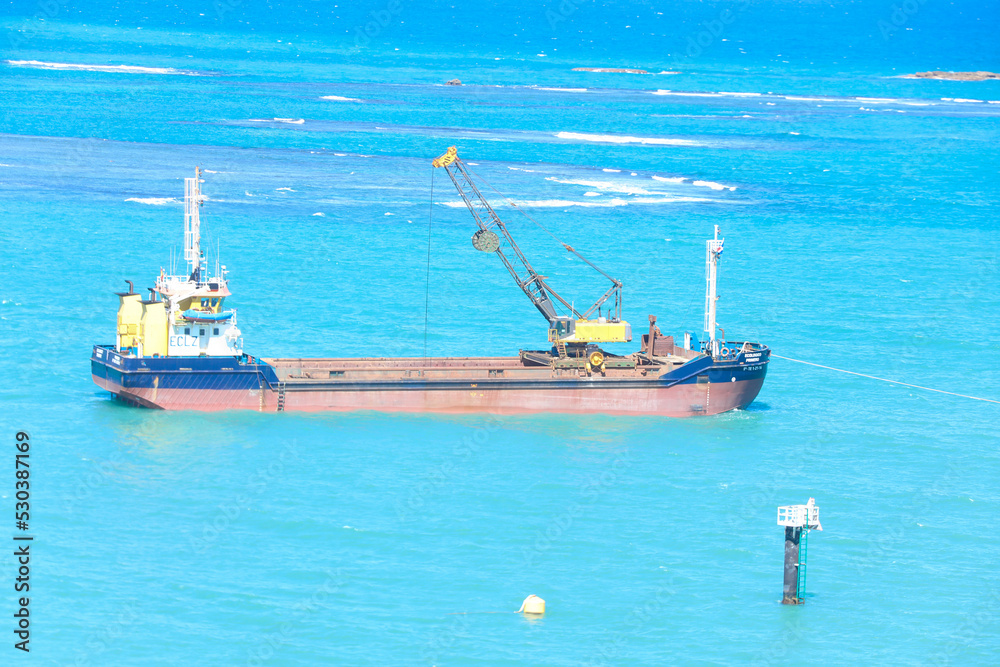 Hopper dredger at sea.Vessel engaged in dredging. Construction Marine ...