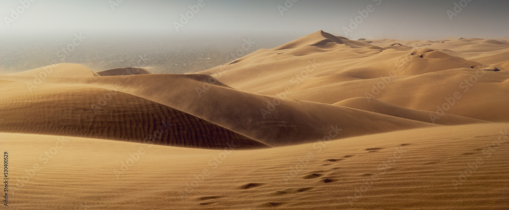 Extreme windy weather over sandy dunes, Namibia. Sand storm and bad ...