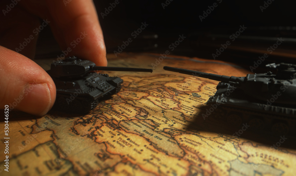 Toy tanks on the map. Military operations in Ukraine. Stock Photo ...