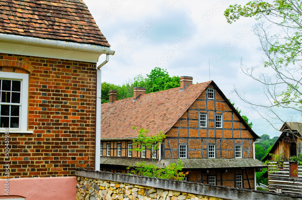 Multiple vintage timber frame and brick buildings in a small town Stock ...