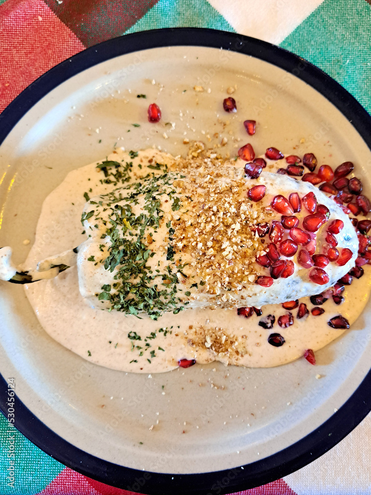 Chile en nogada typical dish from Puebla, Mexico. Poblano pepper ...