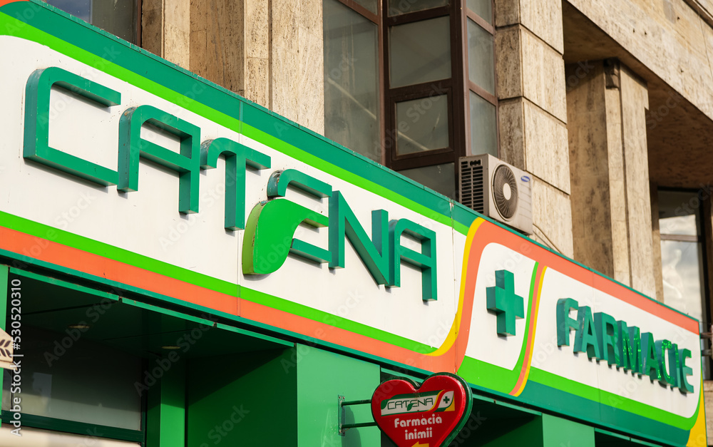 The logo sign of Catena Pharmacy on top of a store from Bucharest ...