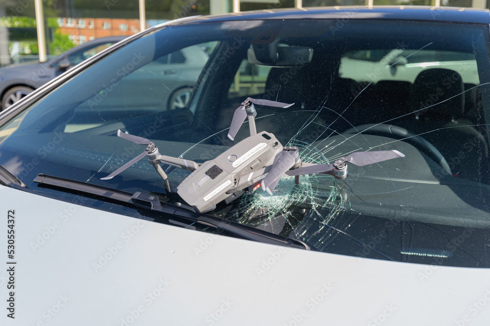 Accident with drone on the road. Windshield and drone destroyed ...