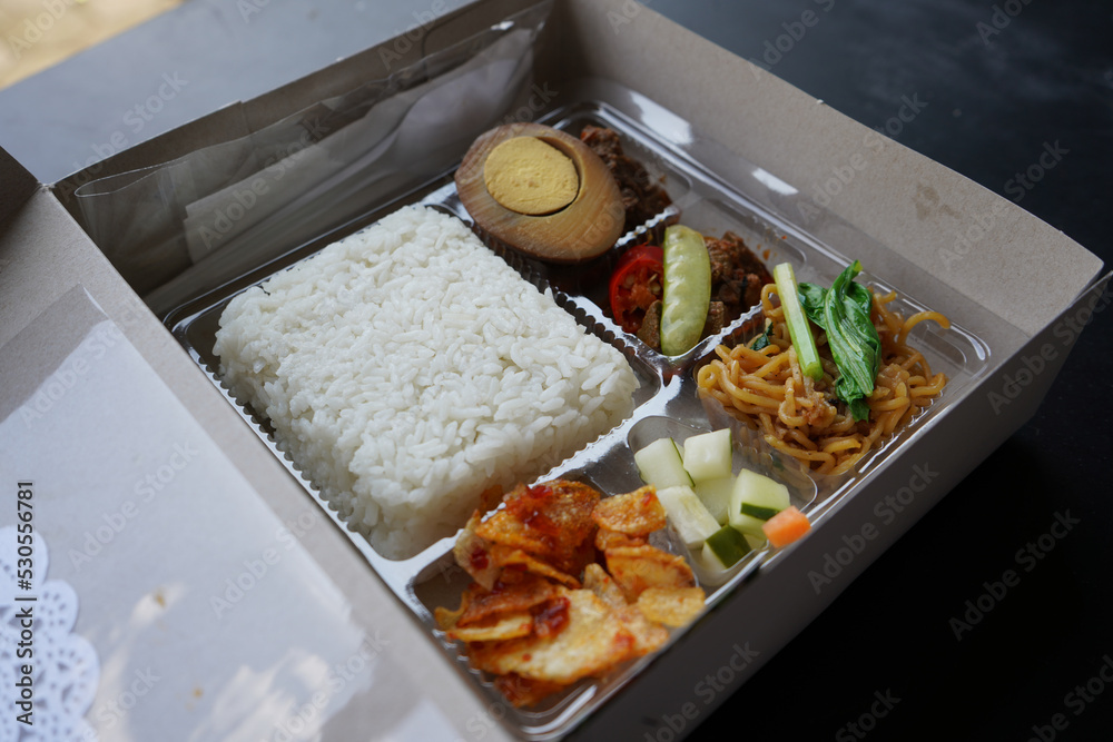 Serving rice boxes in white boxes from cardboard or paper boxes. White ...