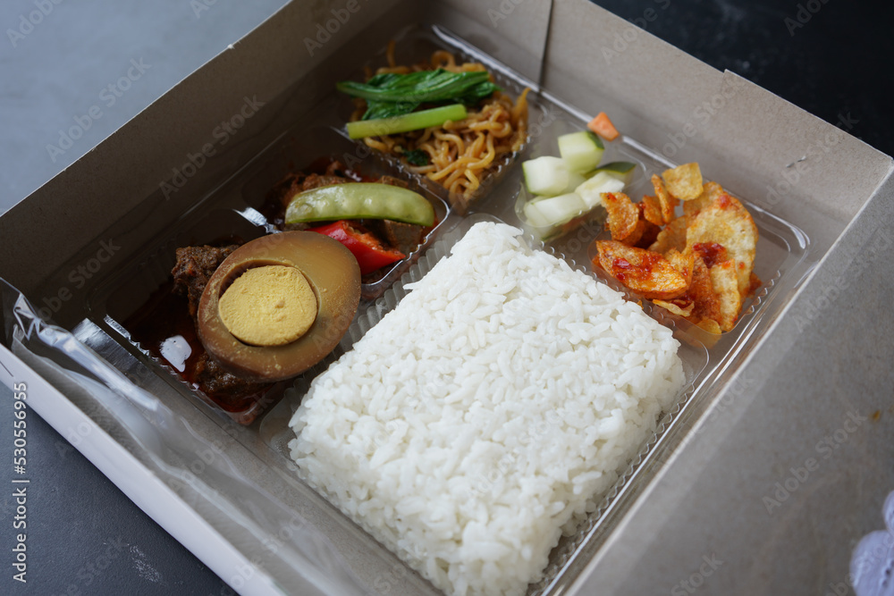 Serving rice boxes in white boxes from cardboard or paper boxes. White ...