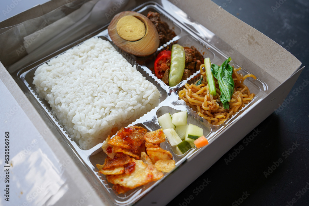 Serving rice boxes in white boxes from cardboard or paper boxes. White ...