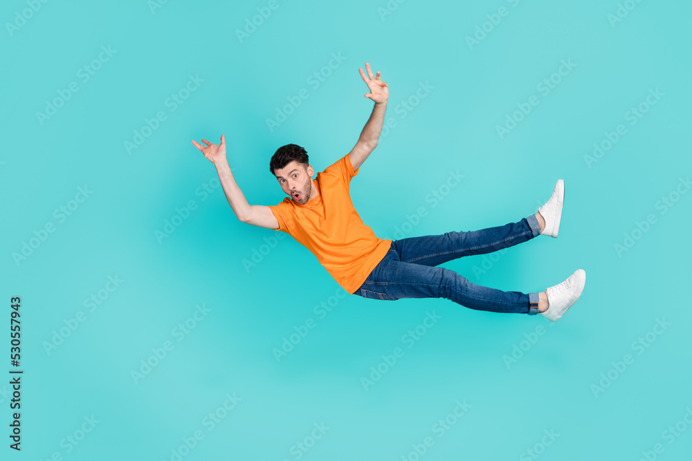 Full size photo of guy falling down feel stupor isolated on aquamarine ...