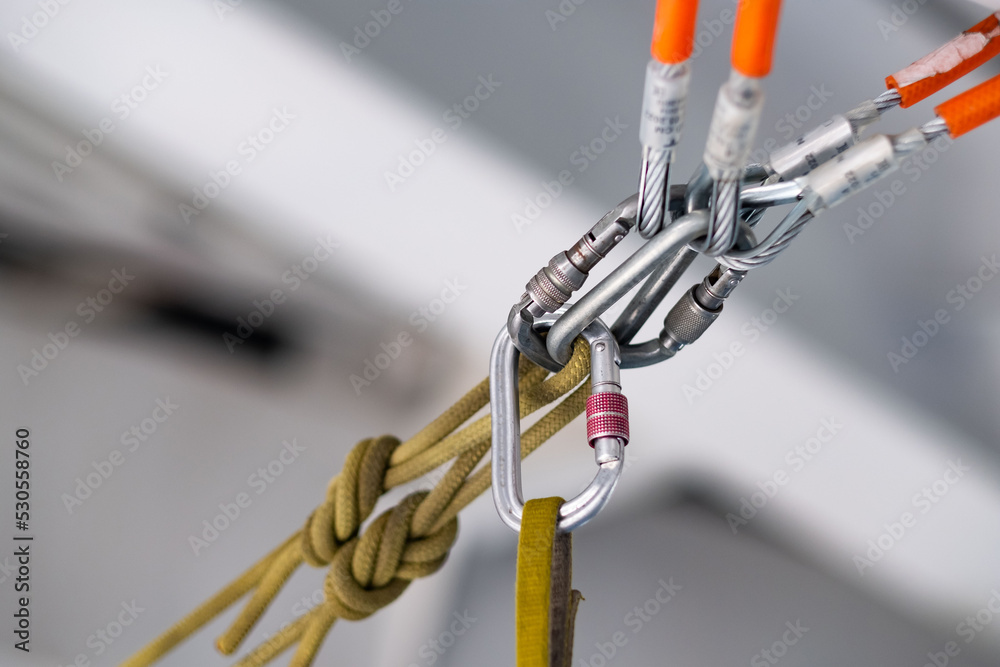 Loaded climbing station at an industrial facility. Steel slings and ...