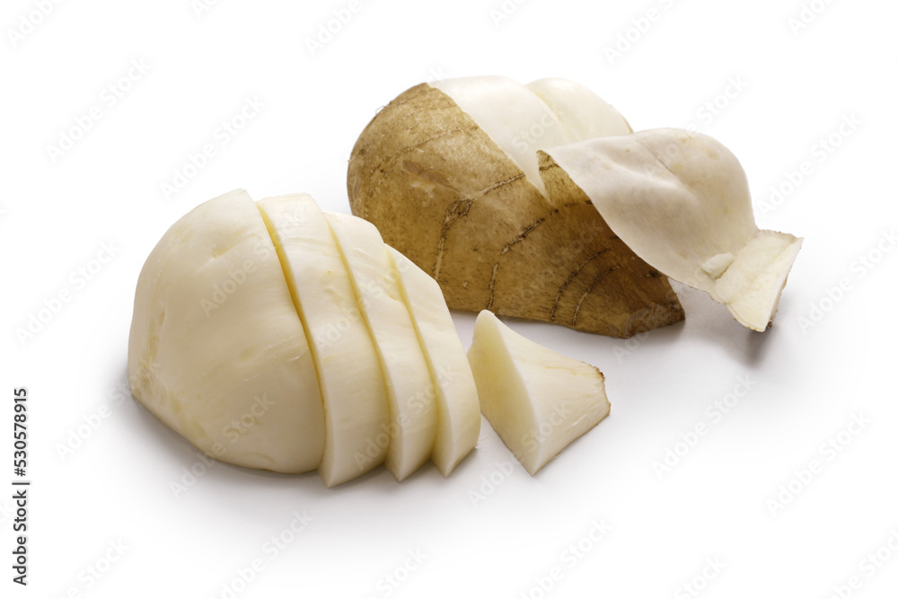 Peeled jicama skin and cut jicama. Jicama is a crispy, slightly sweet ...