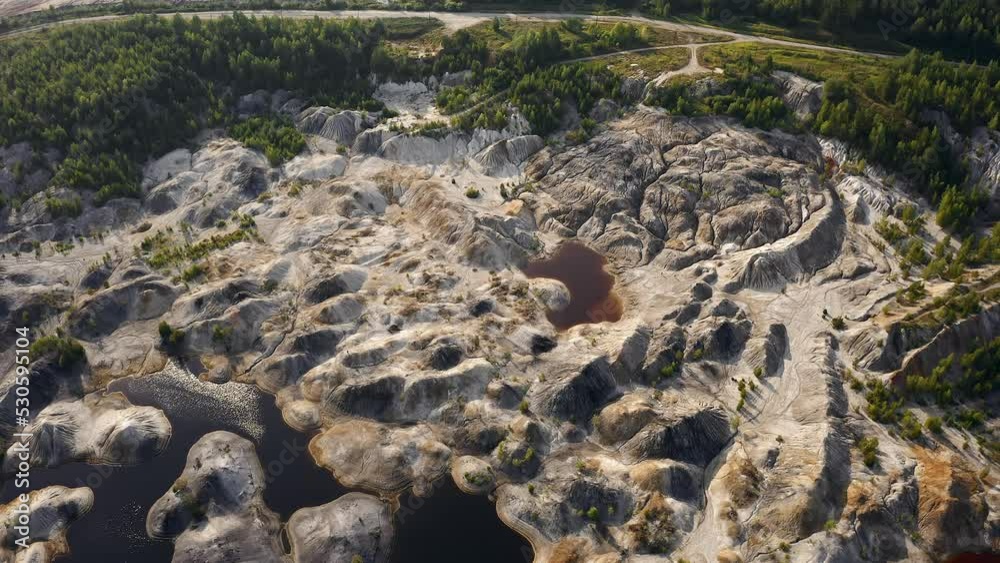 In the frame of the Ural Mars from a bird's-eye view. Stone convolutions and reservoirs of brown ...