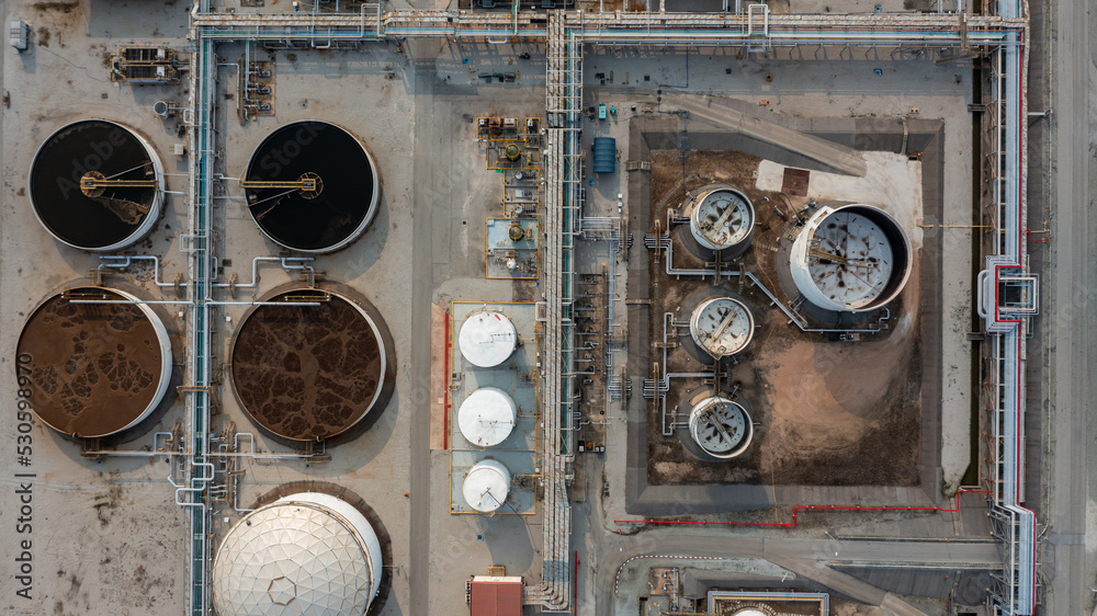 Aerial top view wastewater treatment plant from oil refinery industry ...