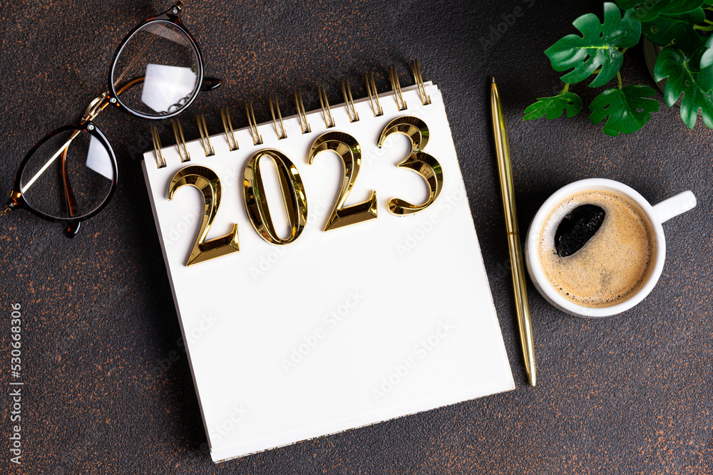 New year resolutions 2023 on desk. 2023 resolutions list with notebook ...