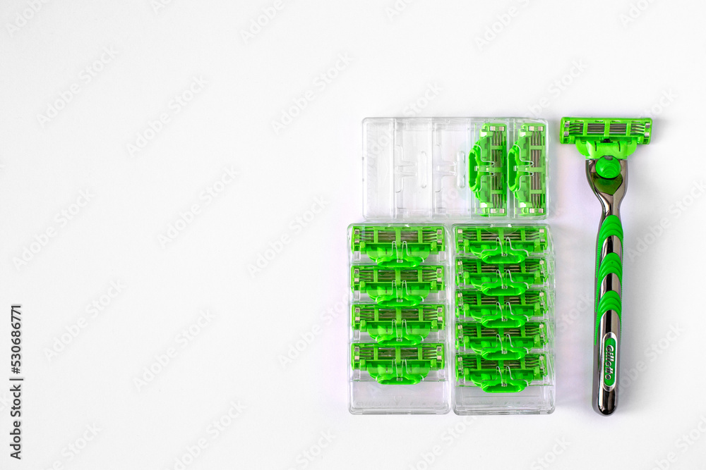 Green razor Gillette Mach 3 and two blocks of spare cassettes for it on ...