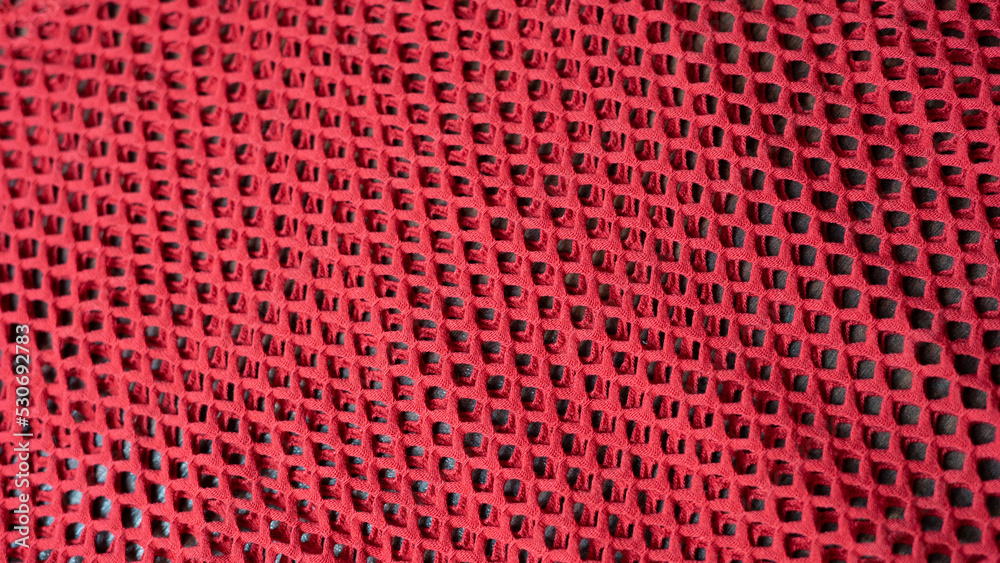 Stoff mit Löchern als Hintergrund Stock Photo | Adobe Stock