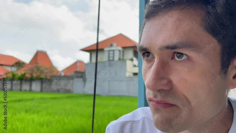 Angry man making evil face of irritation and evil. Close-up male person ...