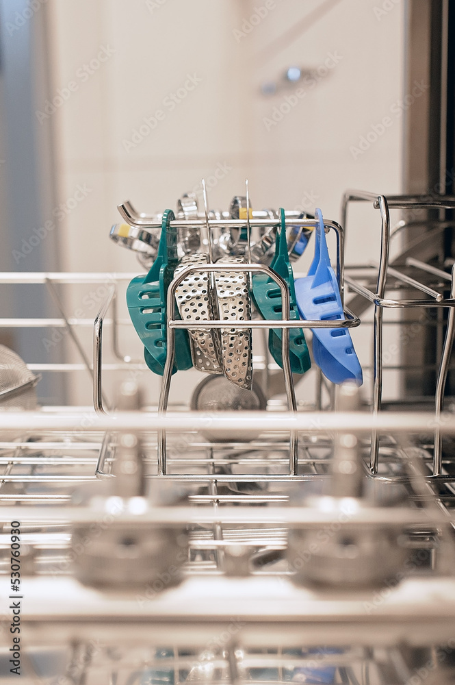 Surgical and dental instruments at medical washing machine and ...