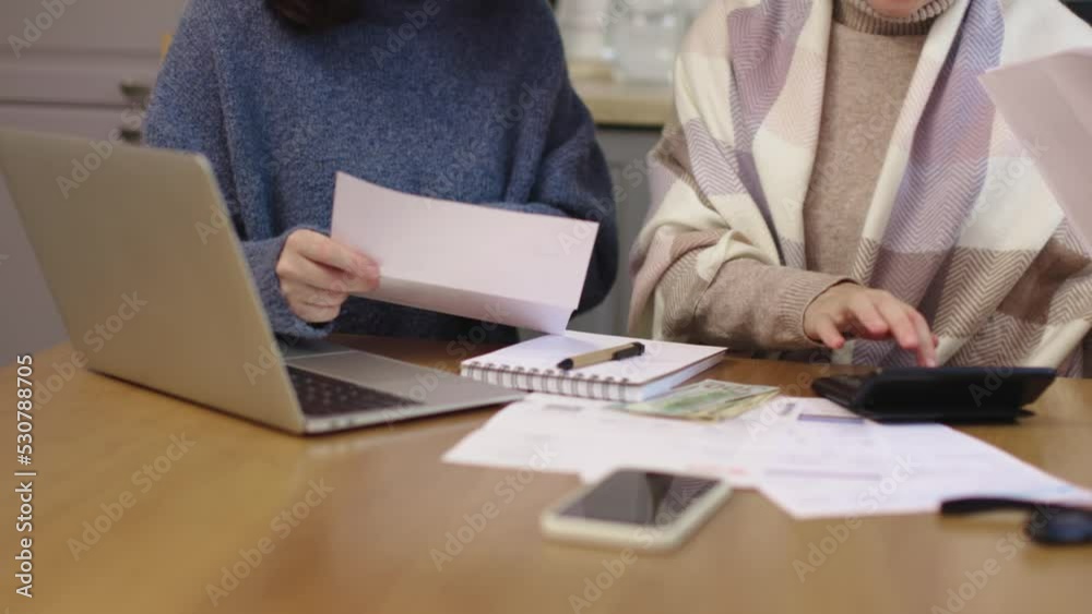 female family counting home family budget reading bank paper letters ... female family counting home family budget reading bank paper letters ...