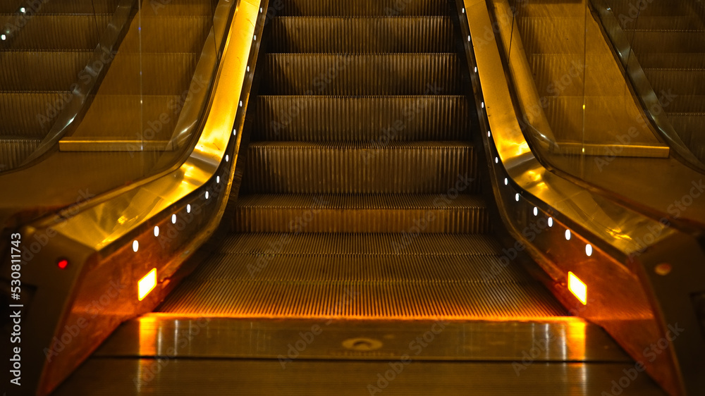 Electric escalator in metro. Moving staircase. Stock Photo | Adobe Stock