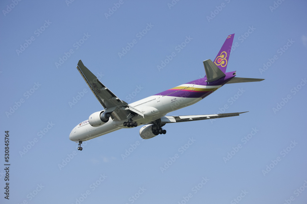 Boeing 777-300ER HS-TKM of Thaiairway. Stock Photo | Adobe Stock