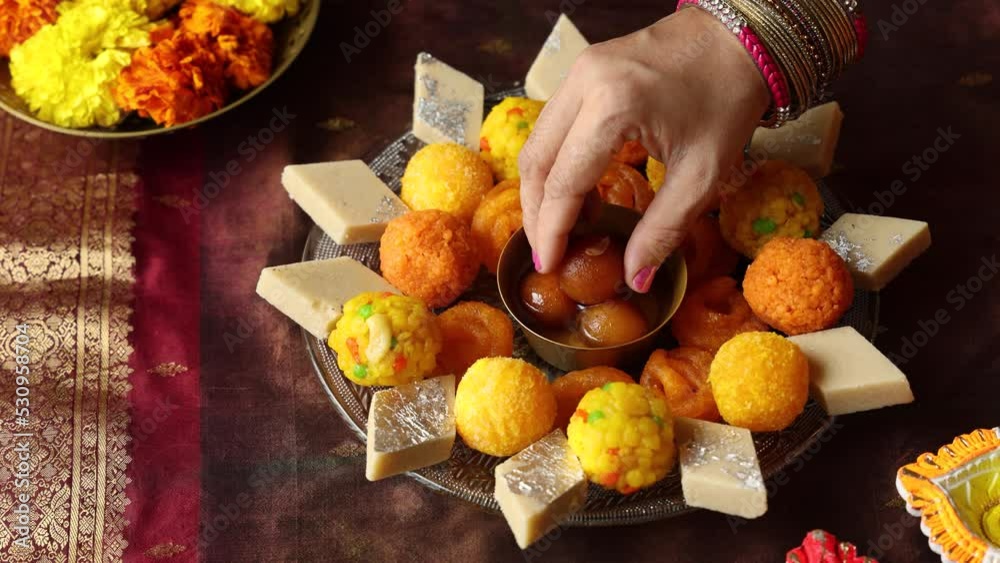 Diwali sweets Gulab jamun, gulaab barfi petha Laddu Jalebi peda Indian ...