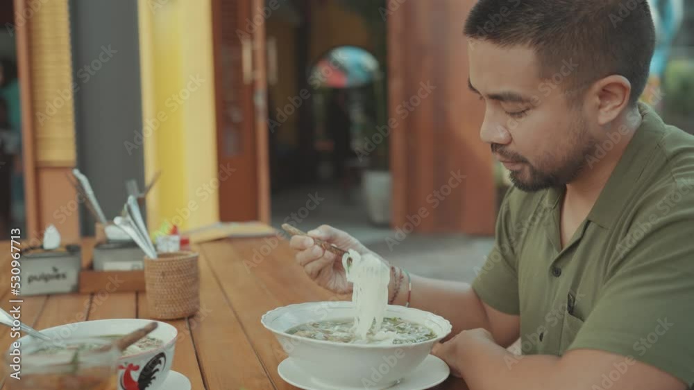 Video „Man Eating Pho Noodle Soup Vietnam Vietnamese National Dish ...