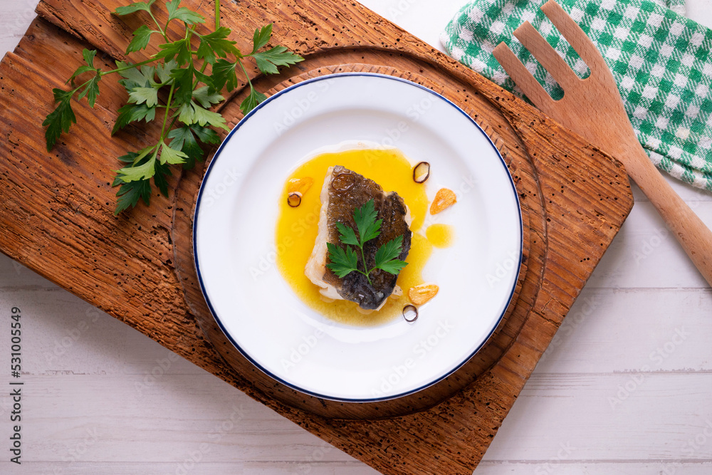 Bacalao al pil pil traditional tapa from the north of Spain. Coconut ...