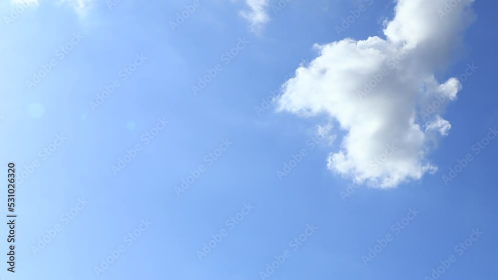 Time lapse of clear blue sky and white clouds. Beautiful white cloud on ...