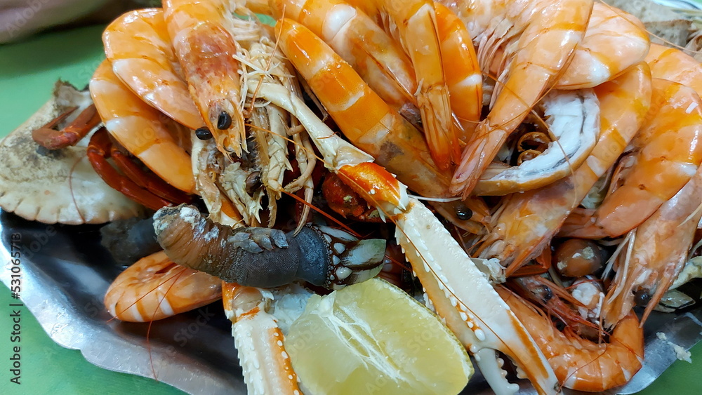 A large plate of different seafood in an old pub in Madrid, Seafood ...