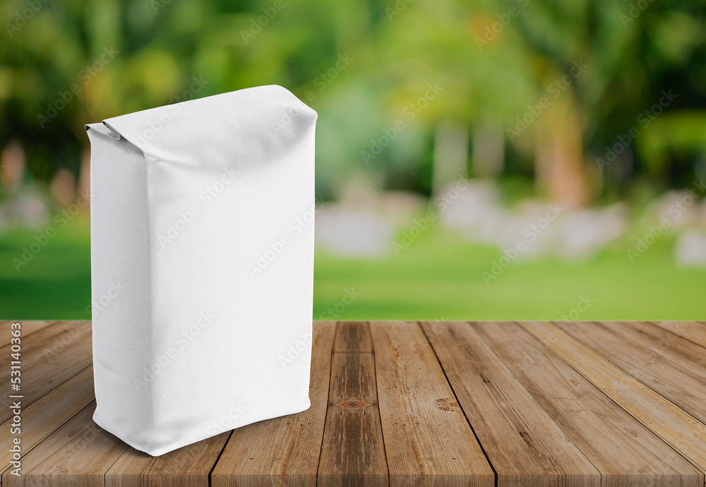 3D Illustration. Paper bag packaging mockup isolated on wooden ...