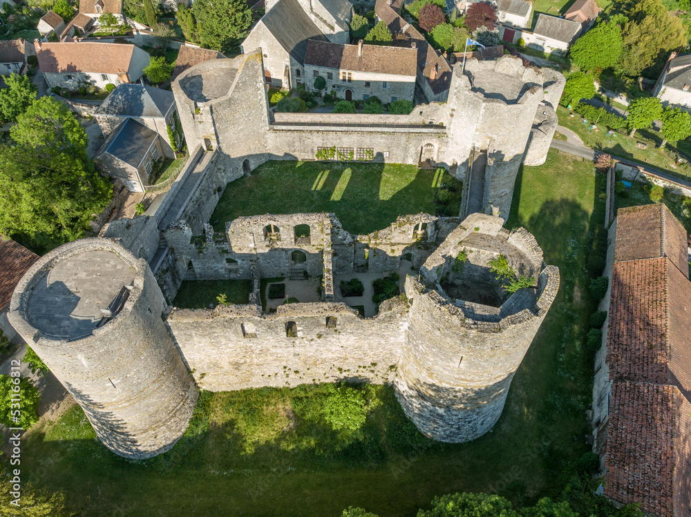 Aerial view of ruined medieval hilltop castle at Yevre le Chatel in ...
