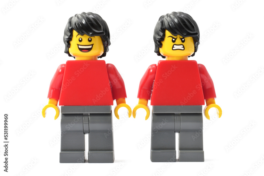 Lego minifigure red torso and black cap smiling and angry. Editorial ...