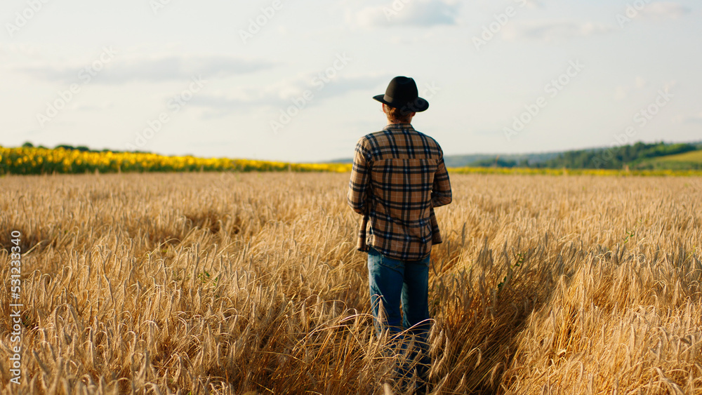 In front of the camera taking video from the back walking to the large ...