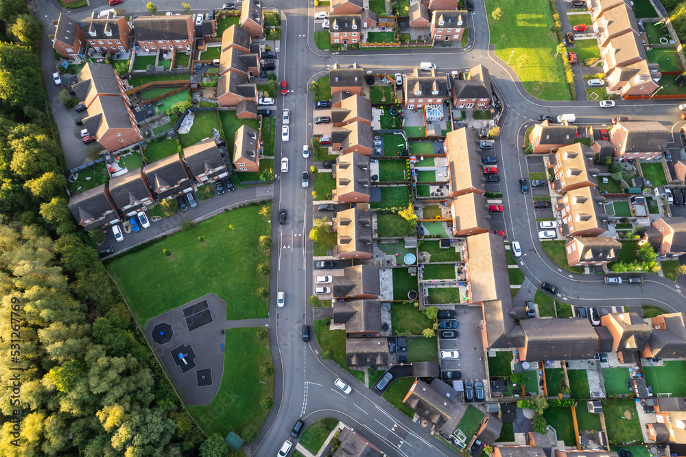 Top down aerial view of houses and streets in a residential area UK New ...