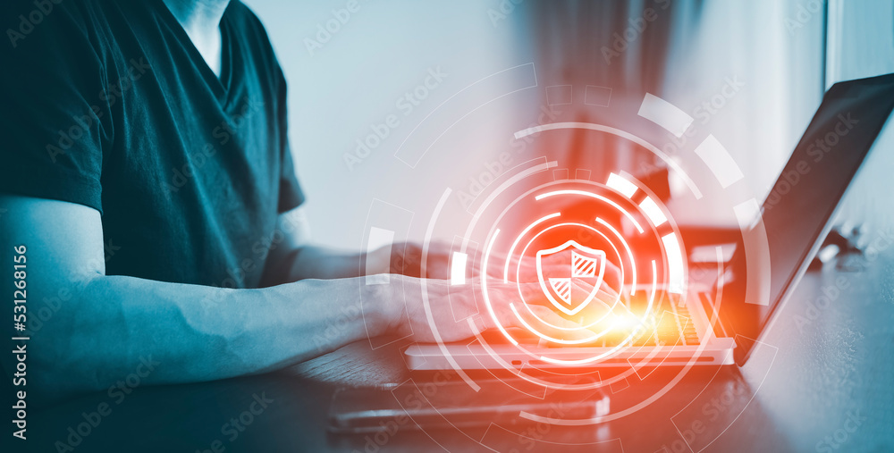 Hand Hacker touch laptop or smartphone and Touching in graph Screen ...