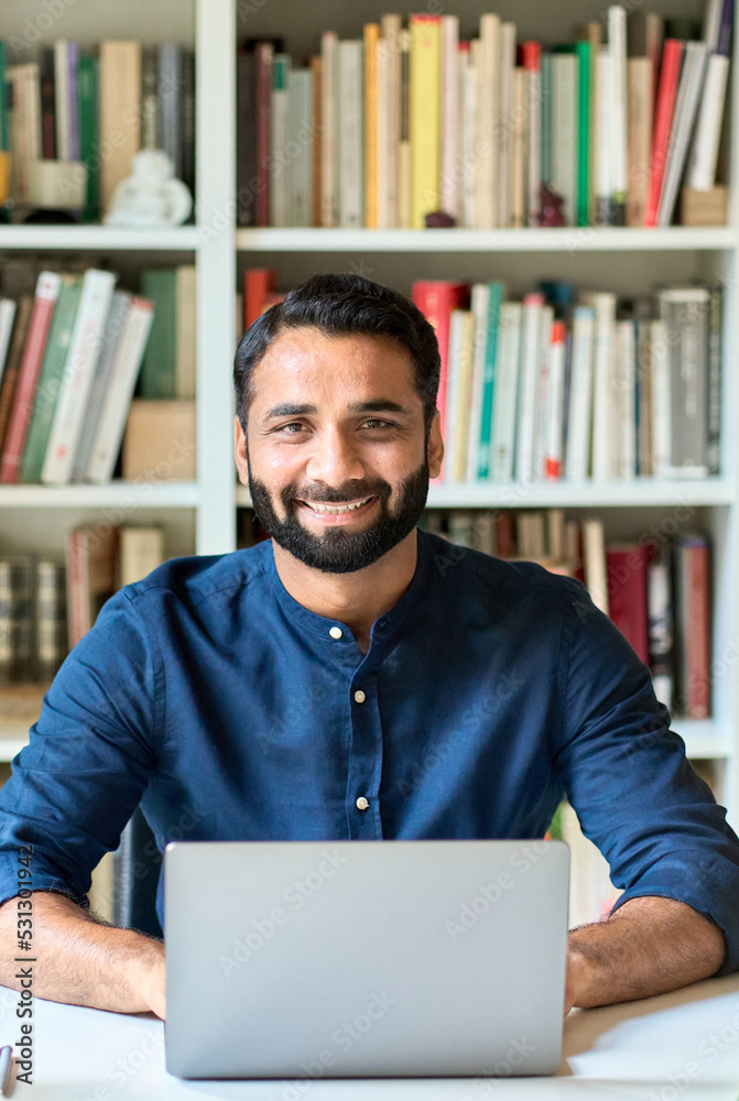 Happy smiling indian ethnic professional business man teacher sitting ...