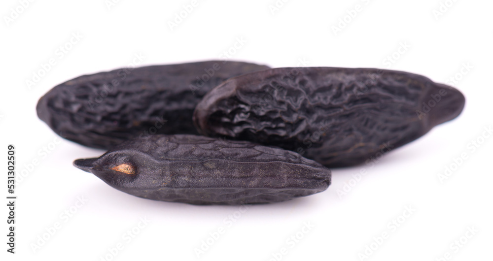Tonka beans isolated on white background. Bean of Dipteryx odorata ...