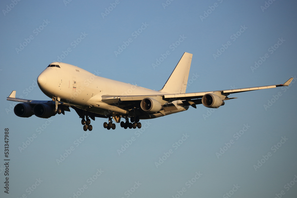 Boeing 747-400 All White Colours cargo Aircraft landing. Stock Photo ...