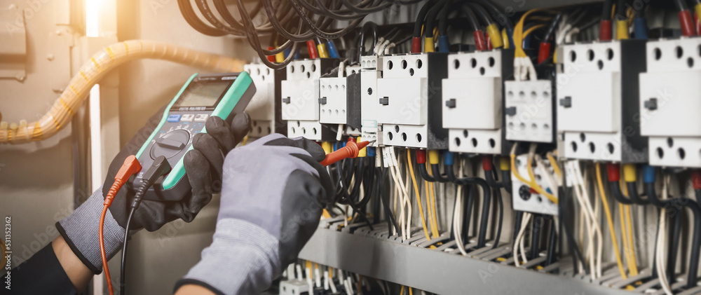 Electricity and electrical maintenance service, Engineer hand holding ...