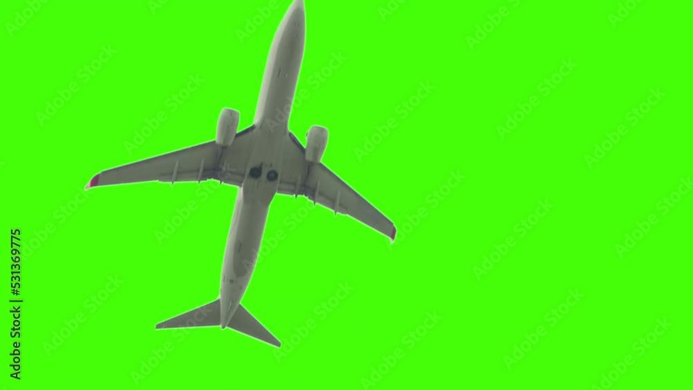Slow motion, bottom view - white passenger airplane, airliner is flying ...