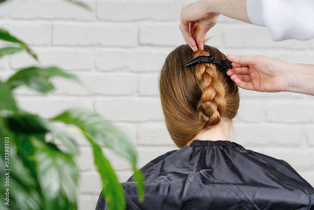 Beautiful girl with long hair. creating a hairstyle for a young ...
