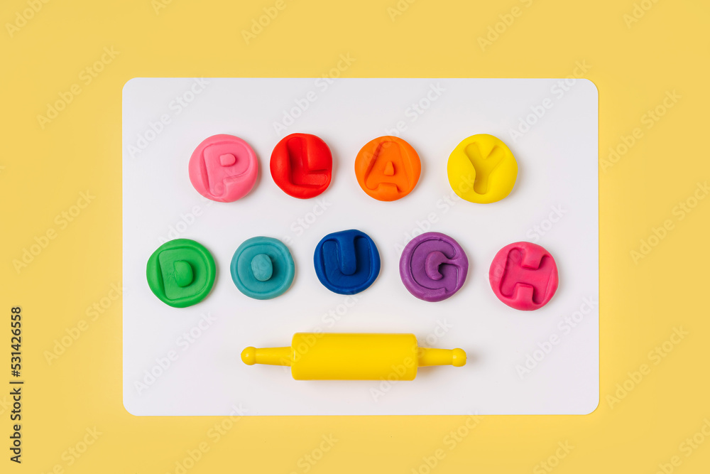 Colorful letters. Inscription Play dough in rainbow colored. Art ...