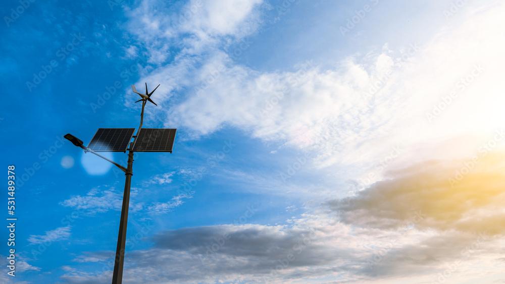 Sun energy solar power. Wind turbine with solar energy power panel ...