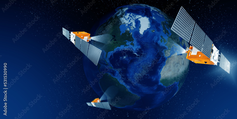 Space sputniks. Three sputniks are flying in space. Satellites ...