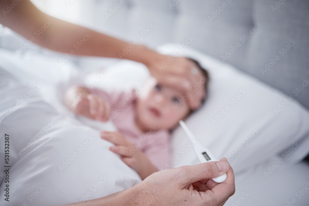 Hands, fever and baby with the hand of a mother taking the temperature ...
