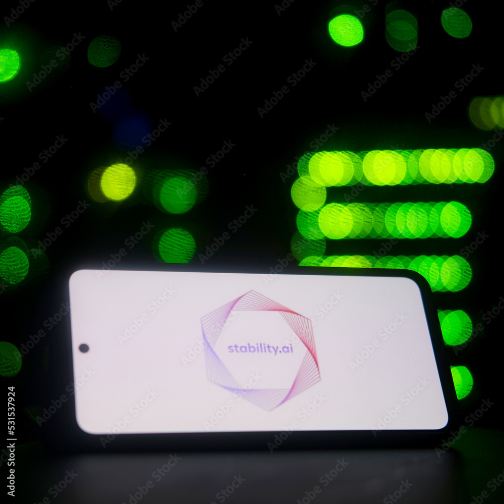 Logo stability ai on the phone screen on the background of the server room. Smartphone with ...