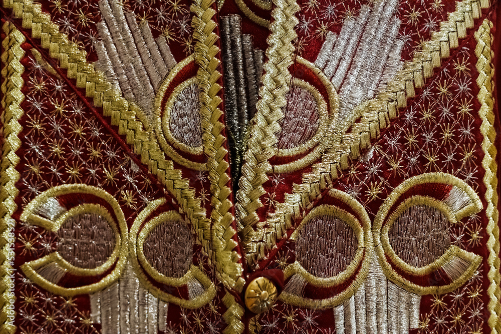 Foto de Details and textures of the fabric of a traditional Greek dress ...