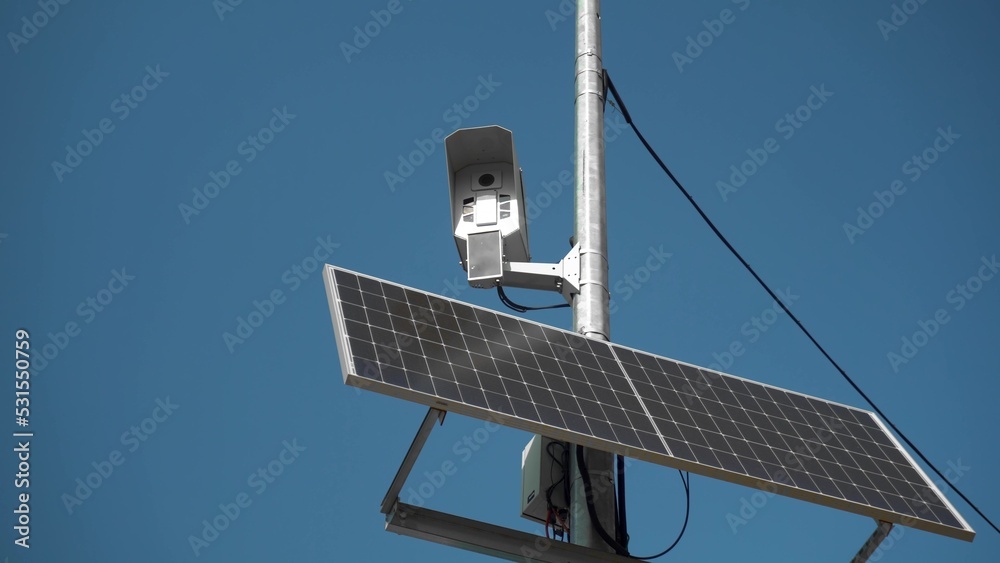 Camera for tracking traffic violations. The camera is powered by a ...