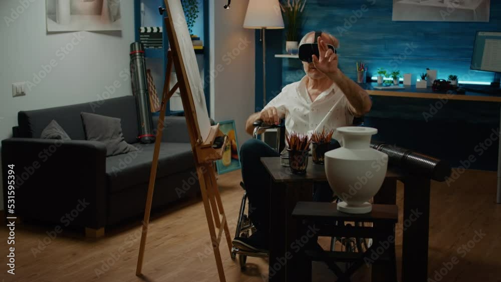 Paralyzed wheelchair user drawing artwork with vr glasses, using ...