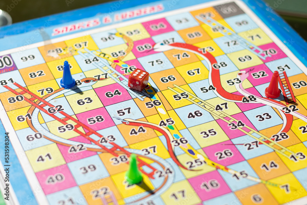 Snakes and ladders board game Stock Photo | Adobe Stock